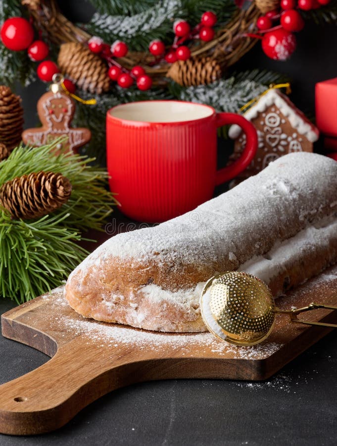 Christmas Pastries Stollen Sprinkled with Powdered Sugar on the Table ...