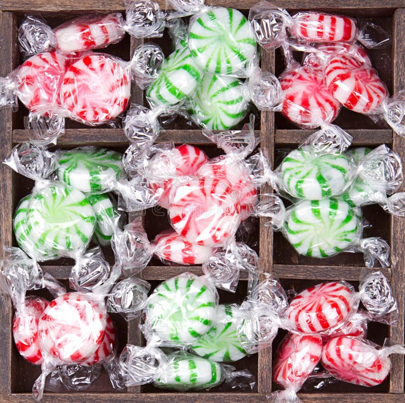Peppermint Candy in Glass Bowl on White. Red Striped Mint Christmas ...