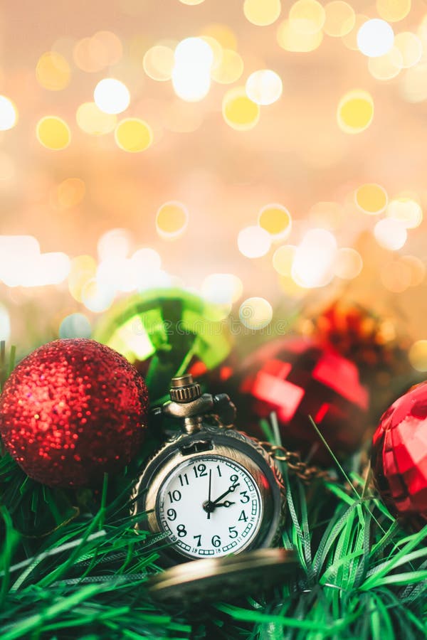 Christmas Pocket Watch with Ball and Gift Box in Blur Background Stock ...