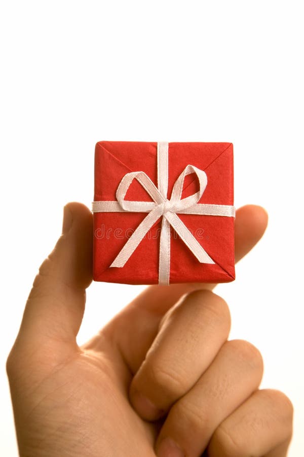 Christmas present in hand stock photo. Image of party - 1518232
