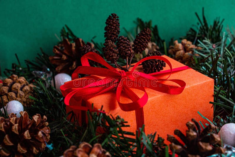 Christmas Present in Orange Wrapping Stock Photo - Image of greeting ...