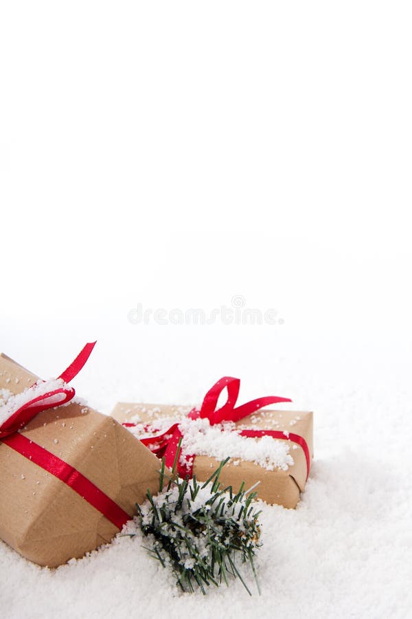 Christmas Presents in Brown Paper with Red Ribbon Stock Image - Image ...