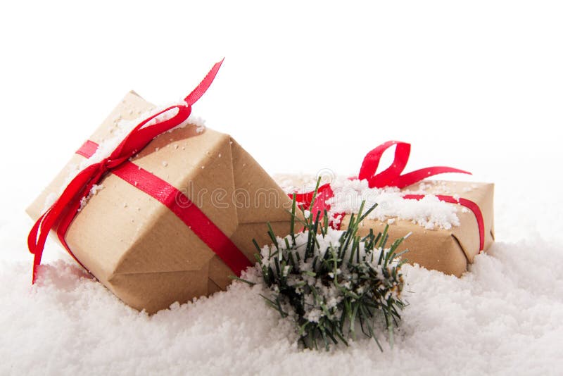 Christmas Presents in Brown Paper with Red Ribbon Stock Image - Image ...