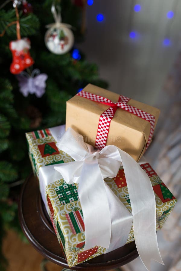 Christmas Presents Under a Tree with Defocused Lights Stock Photo ...
