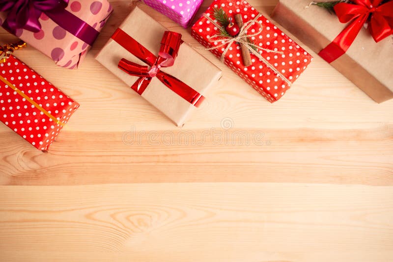 Christmas Presents on a Wooden Table Background Stock Image - Image of ...