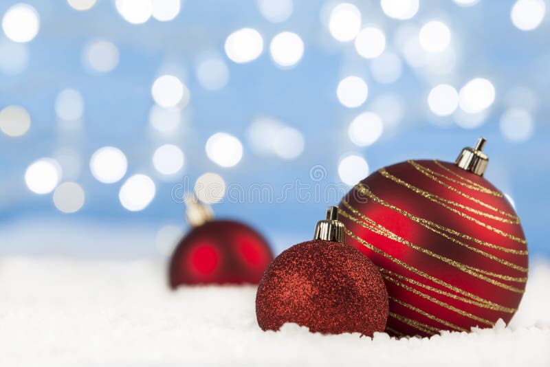 Christmas Red Balls on Snow with Gold and Bokeh Lights Stock Photo ...