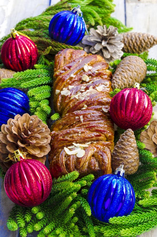 Christmas Roll Yule Log with Caramel and Almonds Stock Image - Image of ...