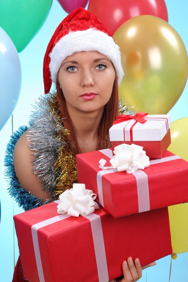 Woman in Santa Helper Hat with Gift Boxes Stock Image - Image of people ...