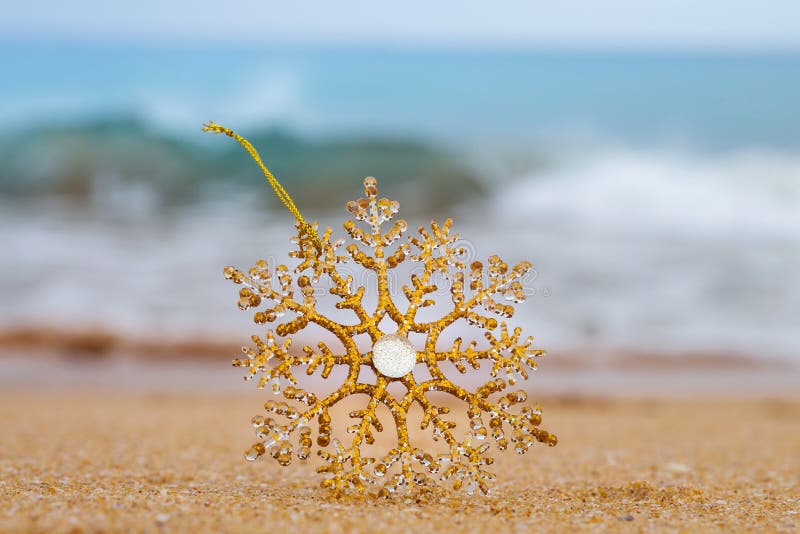 Christmas Snowflake on a Sandy Beach Stock Image - Image of merry ...