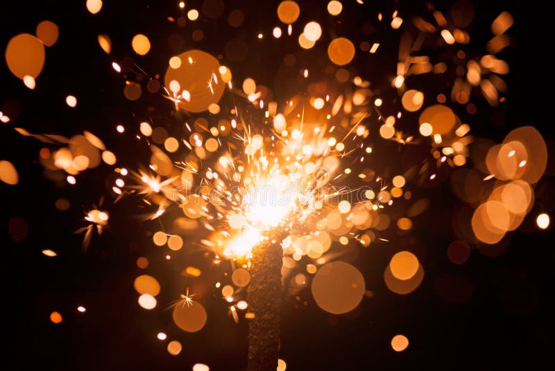 Golden sparkler stock image. Image of explode, candle, black - 566705
