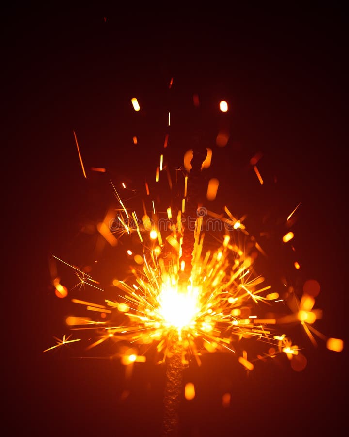 Christmas Sparkler in Haze with Light Stock Photo - Image of particles ...