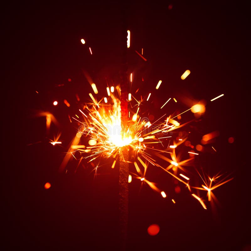 Christmas Sparkler in Haze with Red Light Stock Photo - Image of ...
