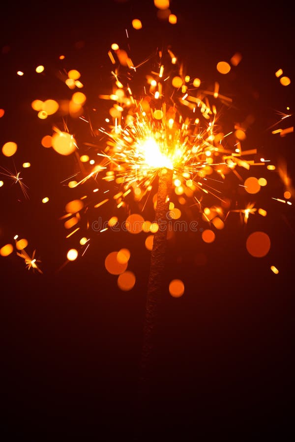 Christmas Sparkler in Haze with Red Light Stock Image - Image of ...