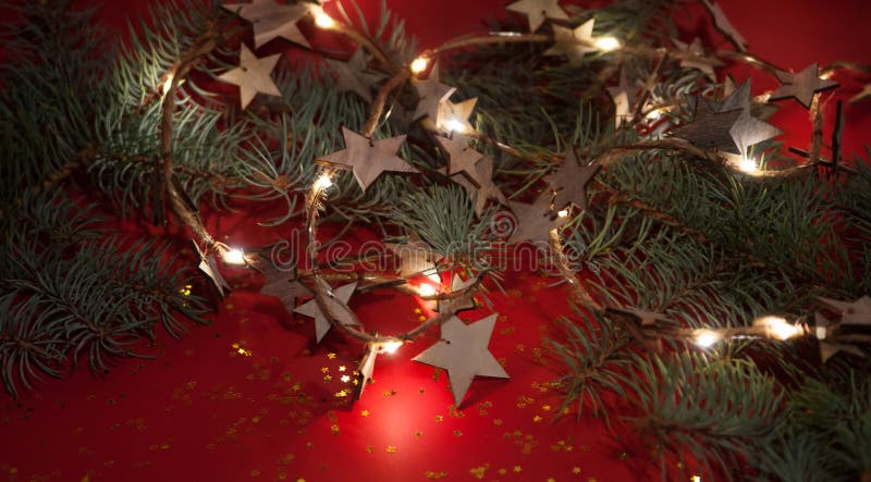 Christmas Garland on Red Background. Stock Image - Image of year, light ...