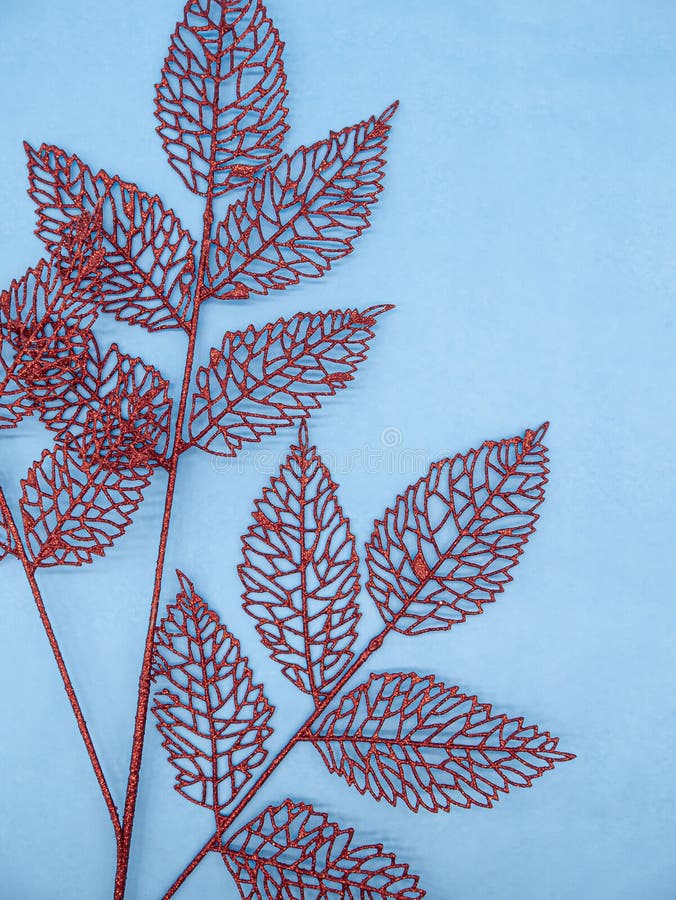 Christmas Still Life, Red Decorative Branch with Patterned Leaves on a ...