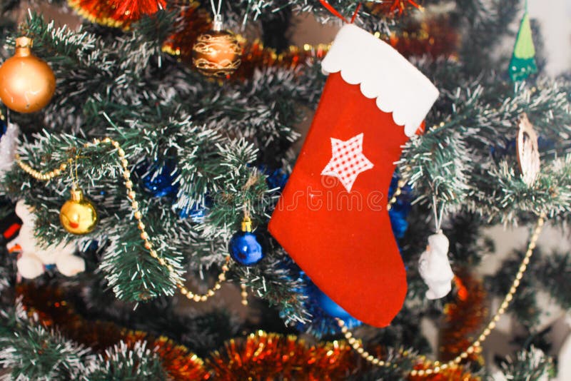 Christmas Stocking on Christmas Tree Stock Photo - Image of seasonal ...