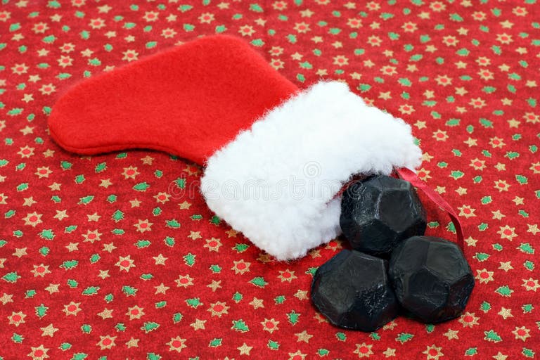 Christmas Stocking with Coal Stock Photo - Image of tablecloth, objects ...