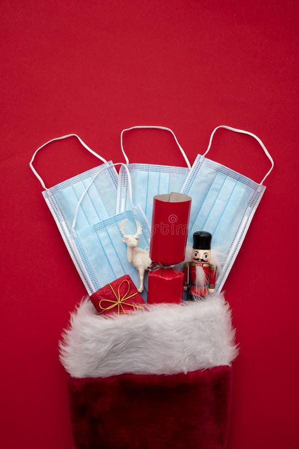 Christmas Stocking with Covid-19 Face Mask and Gifts Stock Image ...