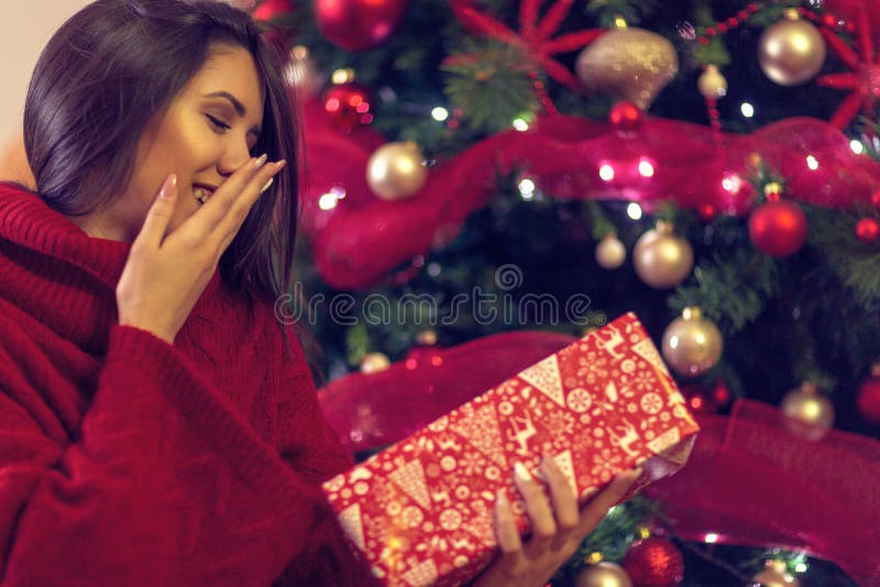 Christmas Surprise Present.Woman and Christmas Present Stock Image ...