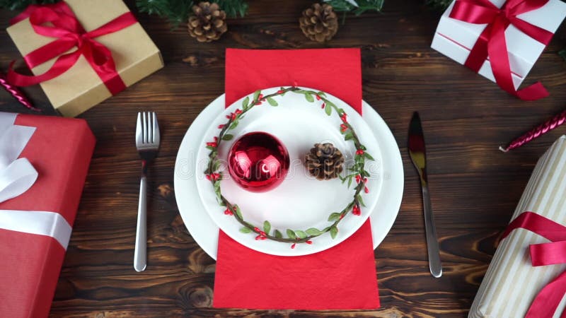 On the Christmas Table Empty Plate and Gifts Stock Video - Video of ...