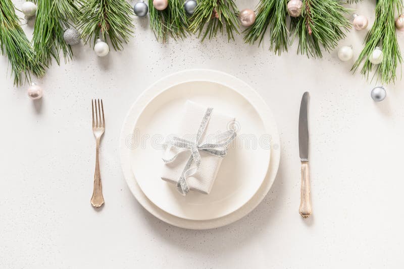 Christmas Table Setting with White Holiday Elegant Decorations on White ...
