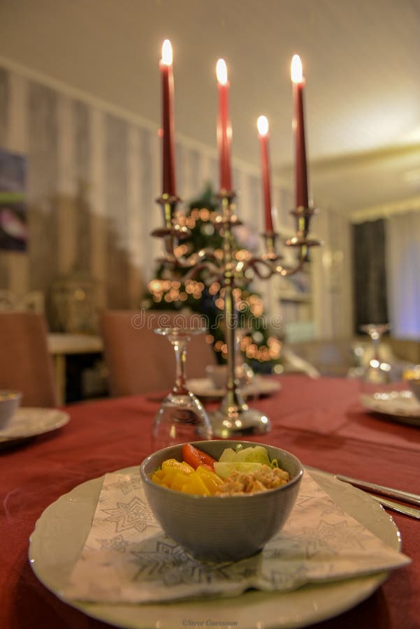 Christmas Table Settings and Lit Candles Stock Image - Image of room ...