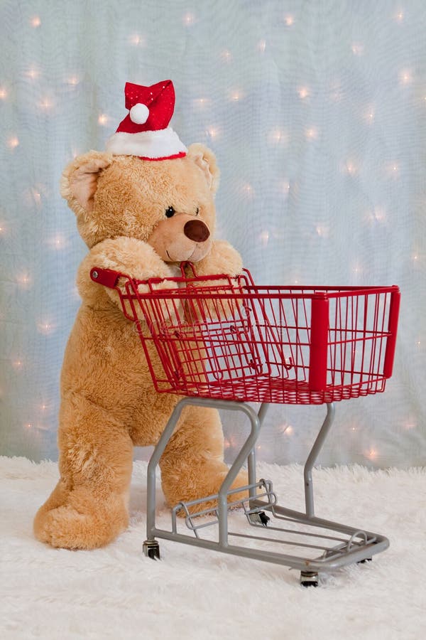 Christmas Teddy Bear Pushing Shopping Cart Stock Image - Image of ...