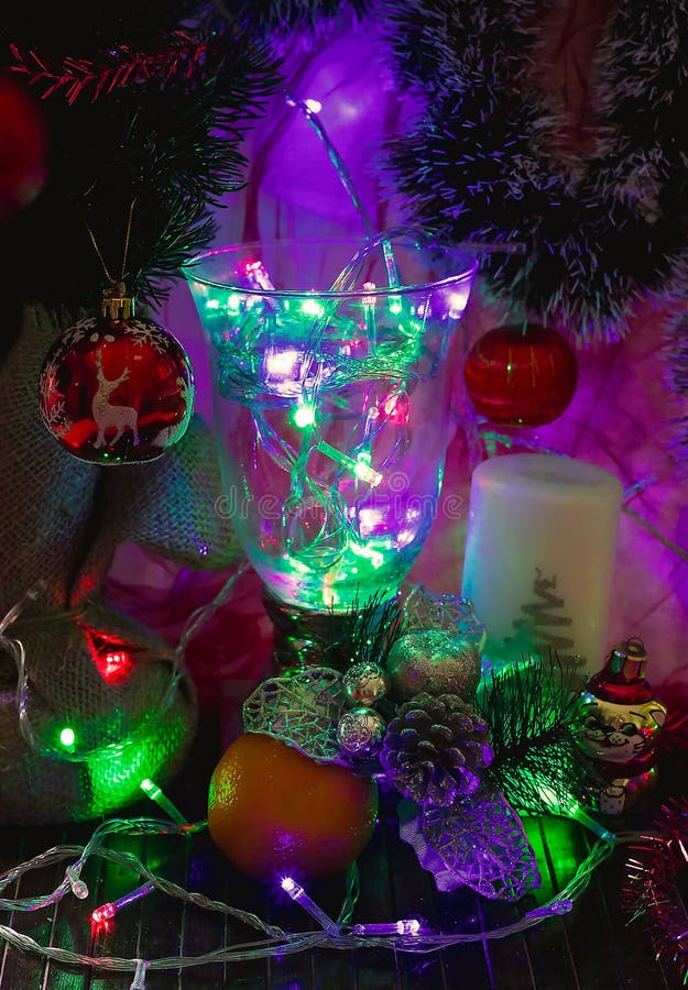 Christmas Theme with Lights, Tree, Mandarin and Candle Stock Photo ...