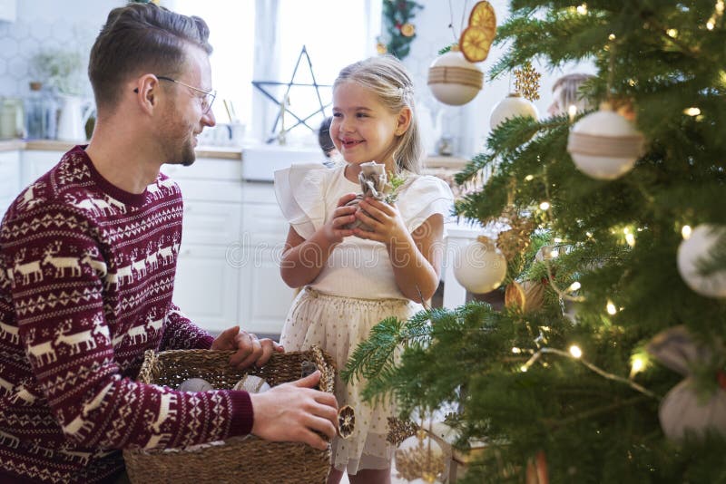 Christmas time with family stock image. Image of decorating - 229414889