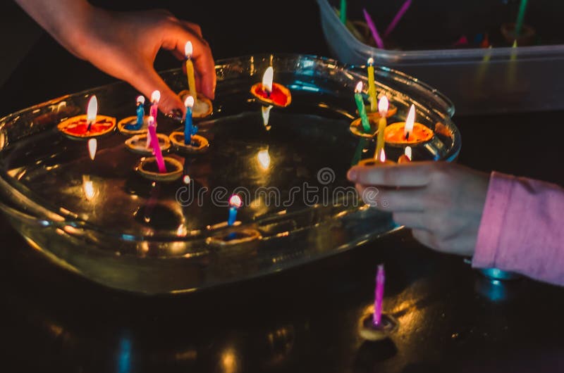 Christmas Traditional Customs - Nut Shell with Burning Candle Floating ...