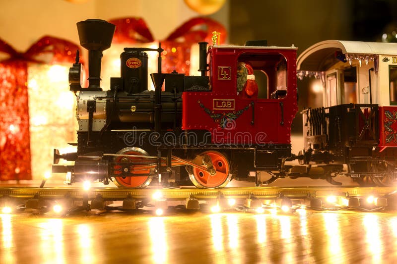 Christmas Train Amid Twinkling Lights and Christmas Decorations ...