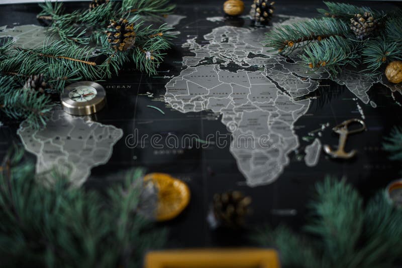 Christmas Tree Branches and Compass on a Black Map Stock Image - Image ...