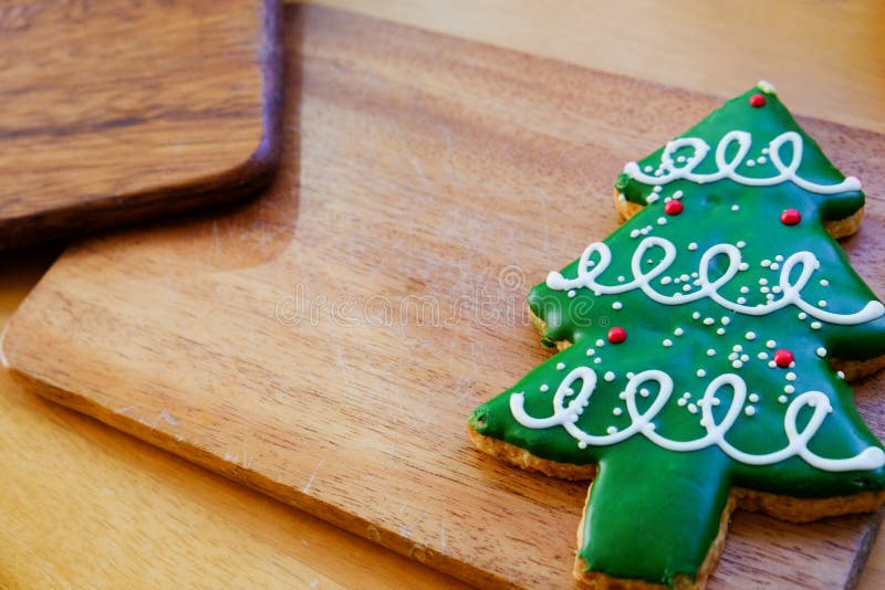 Christmas Tree Cookie on Wood Plate. Stock Photo - Image of designs ...