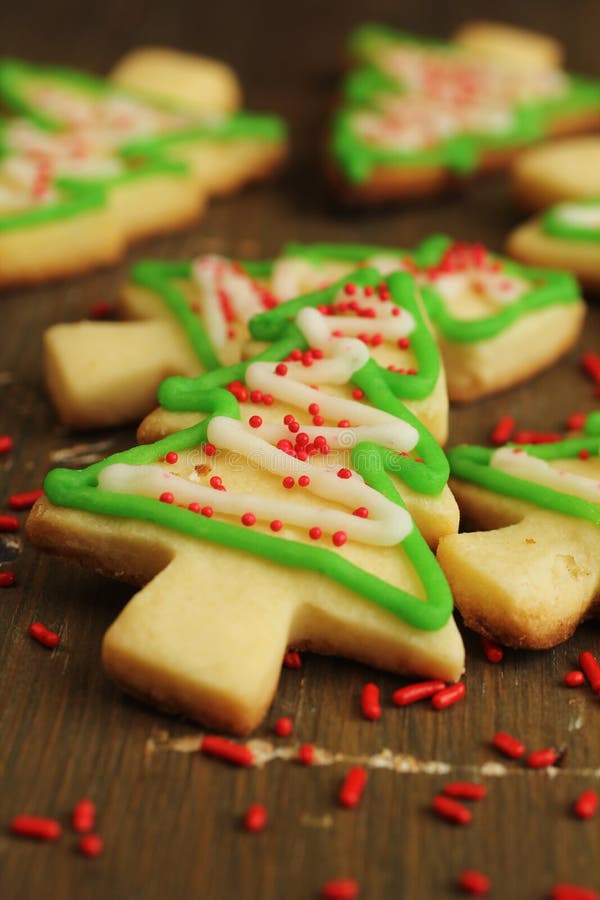 Star Shaped Christmas Cookies and Pine Tree Branch on Wood Stock Photo ...