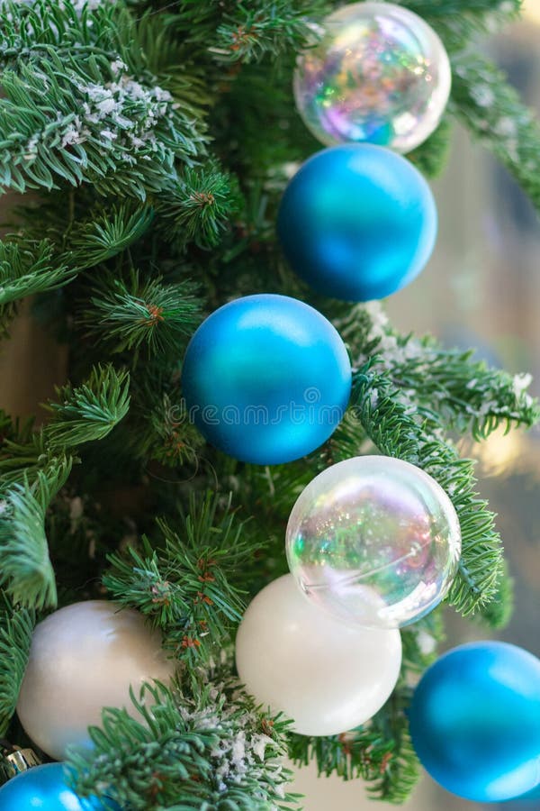 Christmas Tree Decorated with Blue, White Balls on a Branches Stock ...