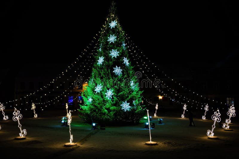 Christmas Tree Decorated with Lights and Decorations in the Town Square ...