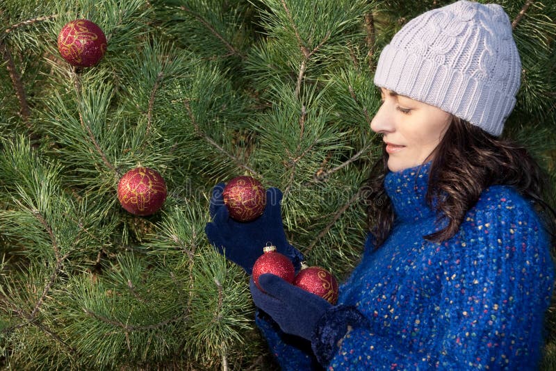 Christmas tree decorating stock image. Image of happiness - 10928925