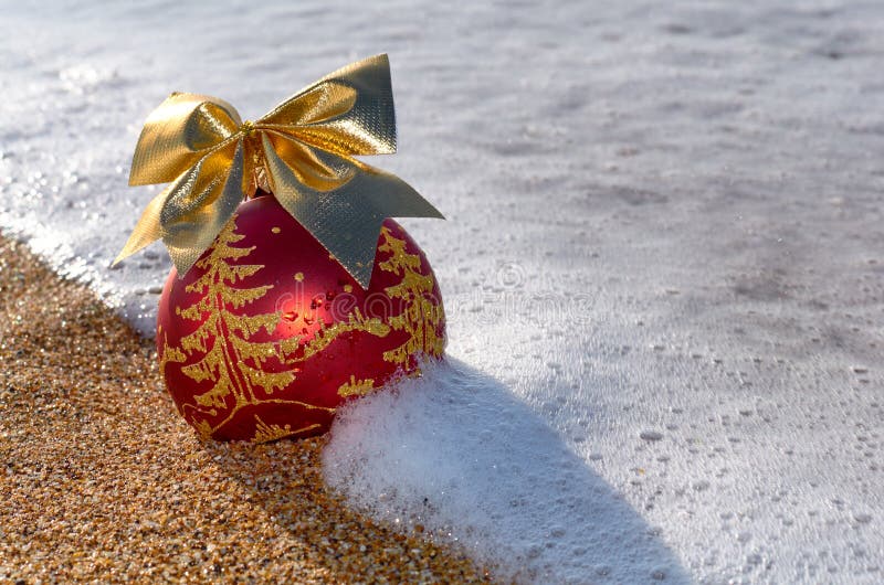 Christmas Tree Decoration on the Beach Sand in Sea Wave Stock Image ...
