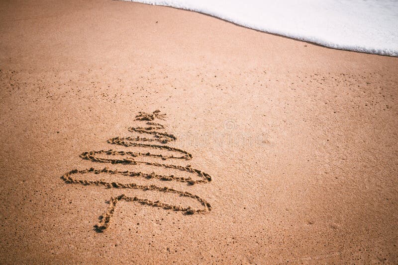 Christmas Tree Drawn in Sand at the Beach. Stock Photo - Image of good ...
