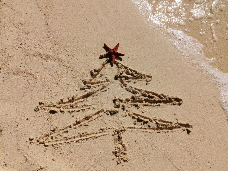 Christmas Tree Drawn in Sand at the Beach. Holiday Concept Stock Photo ...