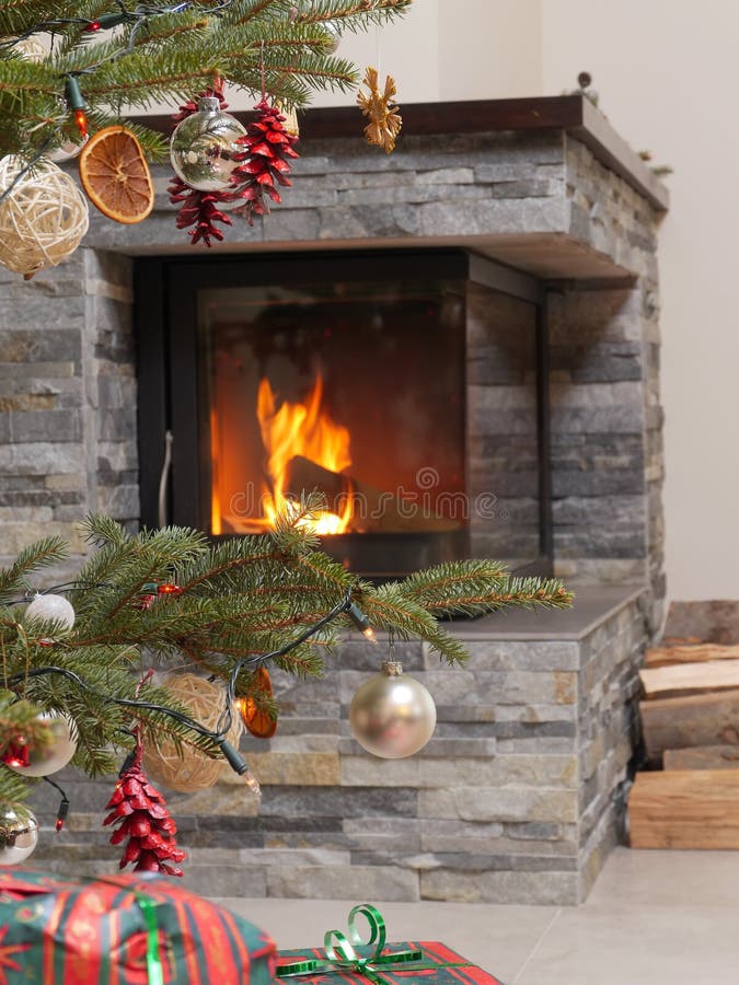 Christmas Tree by the Fireplace Stock Photo - Image of celebrate, ball ...