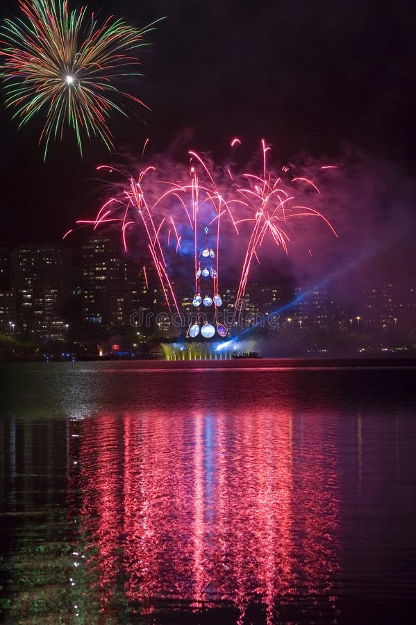 Christmas Tree and Fireworks Stock Photo - Image of decorated, black ...