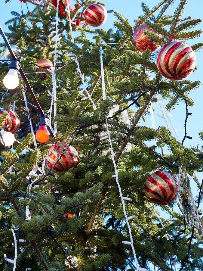 Christmas Tree and Garland Light Bulbs at Fair Stock Image - Image of ...