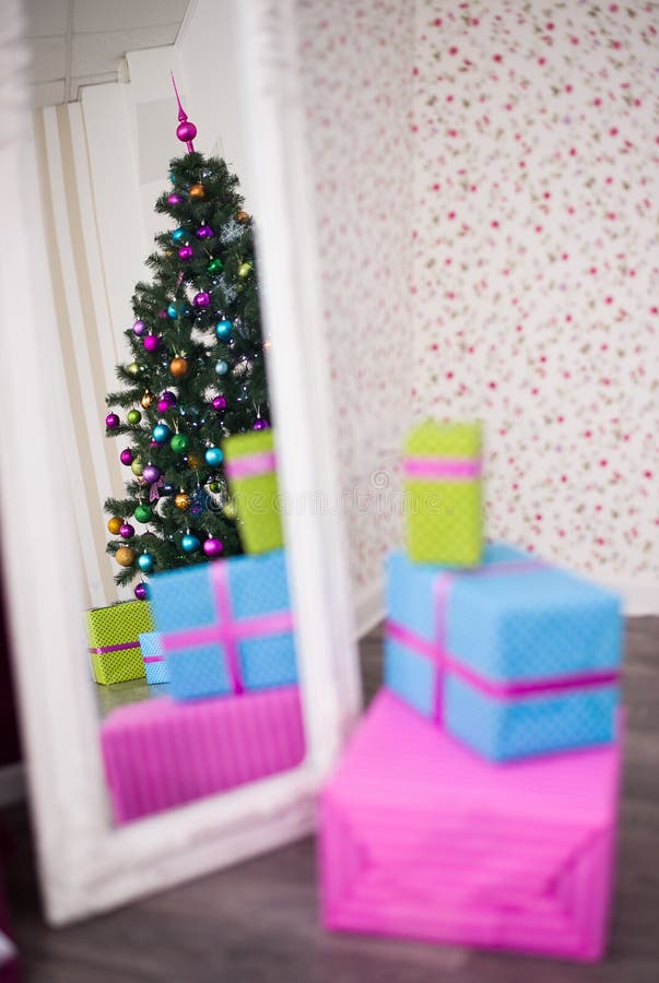 Christmas Tree and Gifts Reflected in the Mirror Stock Photo - Image of ...