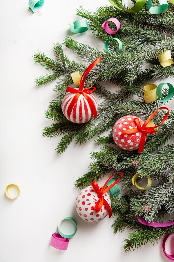 Christmas Tree Branches and Decorations on Light Surface Holiday ...