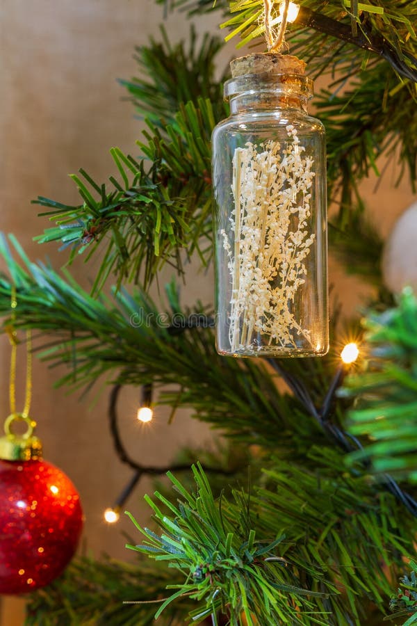 Christmas Tree of Hanging Decorative Items Including a Decor Bot Stock ...