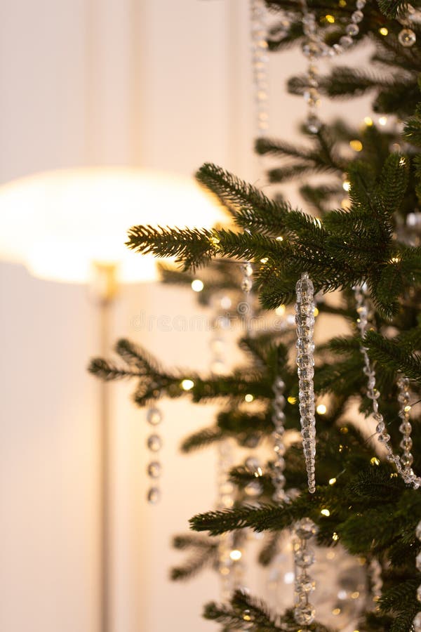 A Christmas Tree with a Lot of Lights and Decorations, in the ...