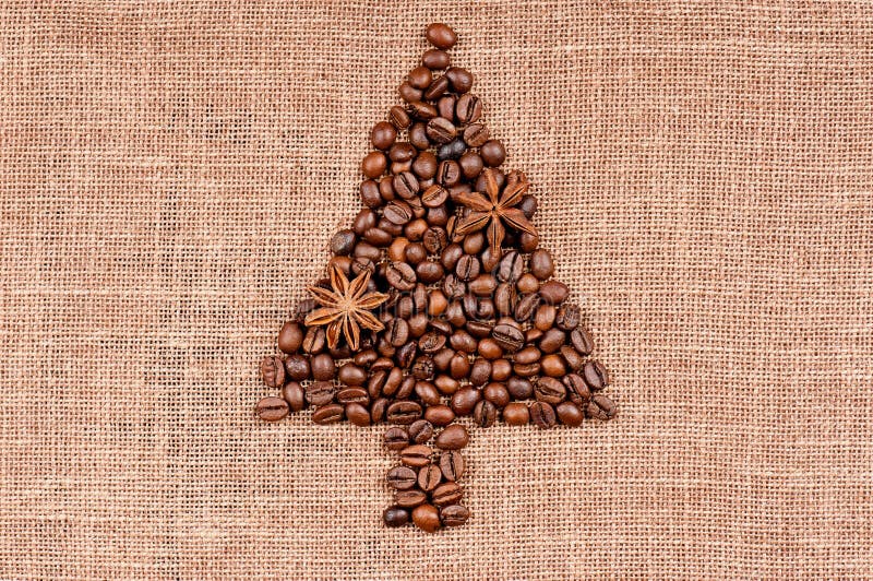 Shape of Christmas Tree Made of Coffee Beans on Wooden Table Stock ...