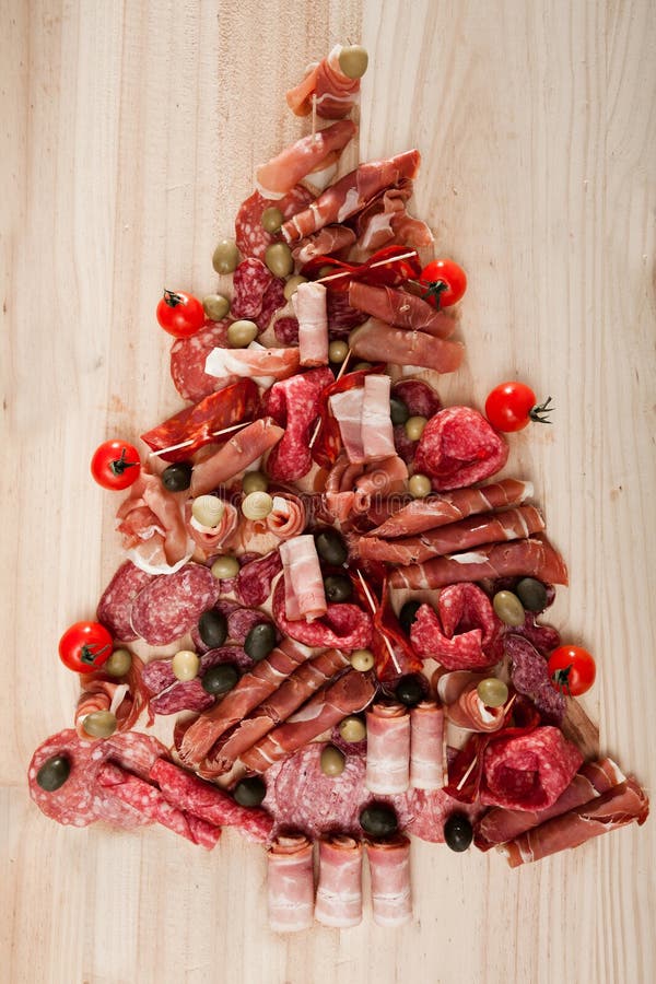 Christmas Tree Made of Sausage on a Background of a Wooden Wall Stock ...