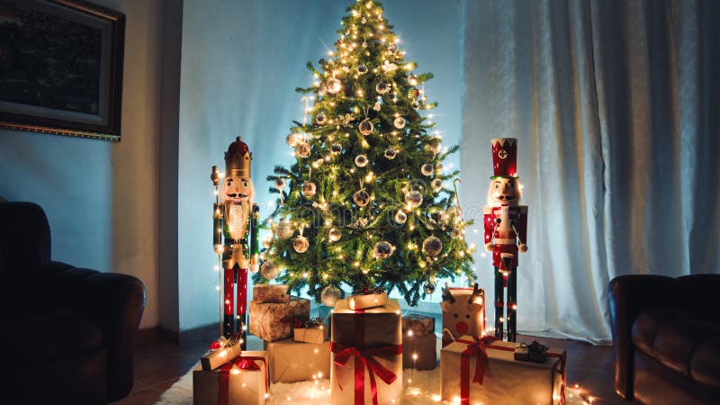 The Christmas Tree with Nutcrackers and Presents Stock Photo - Image of ...